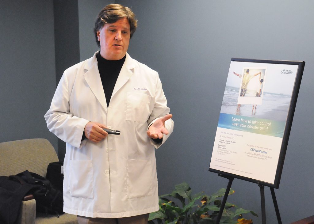 Masking the Pain - Herald-Standard